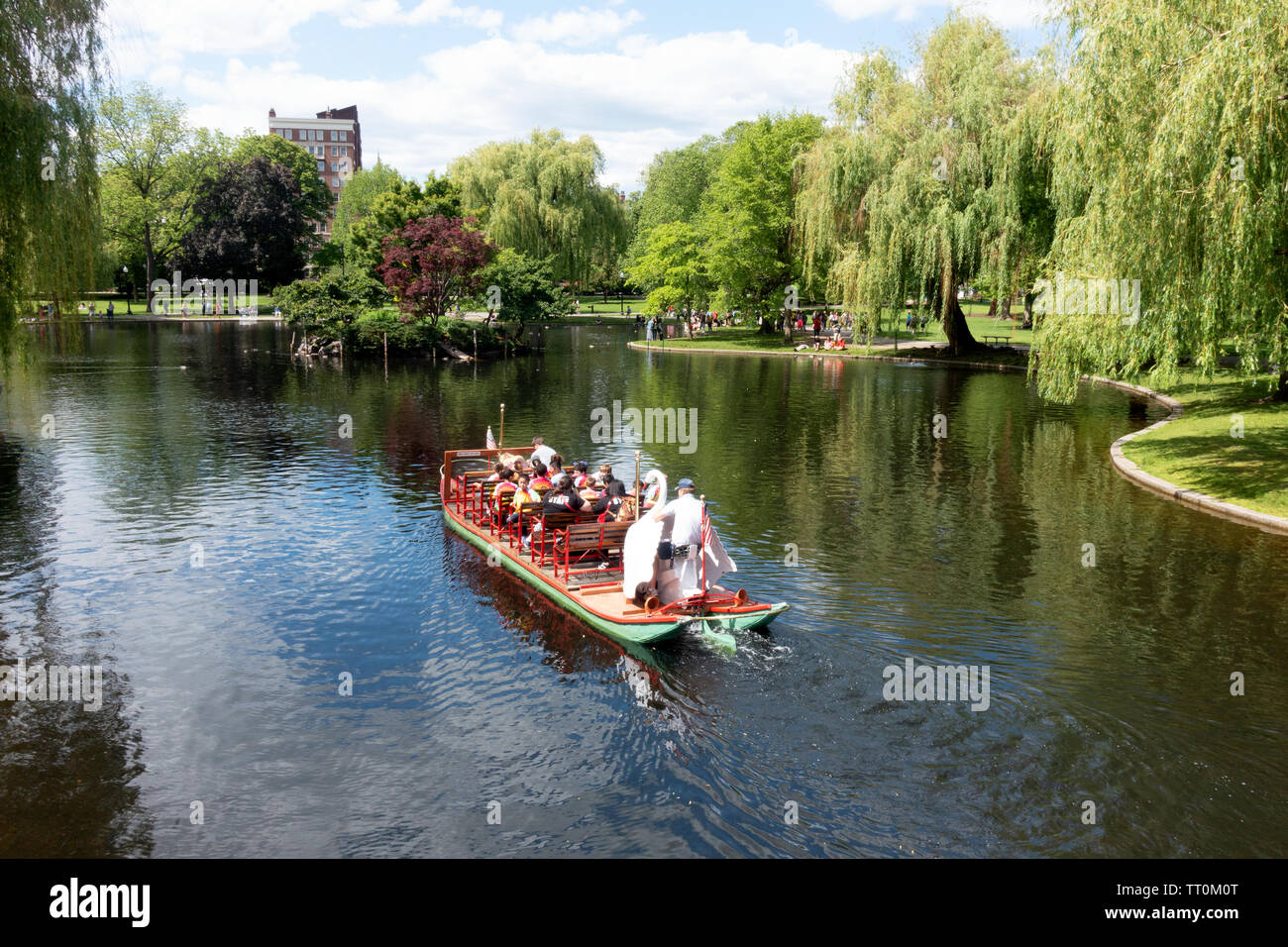 Swan boat in the lagoon at the Boston Public Garden adjacent to Boston ...