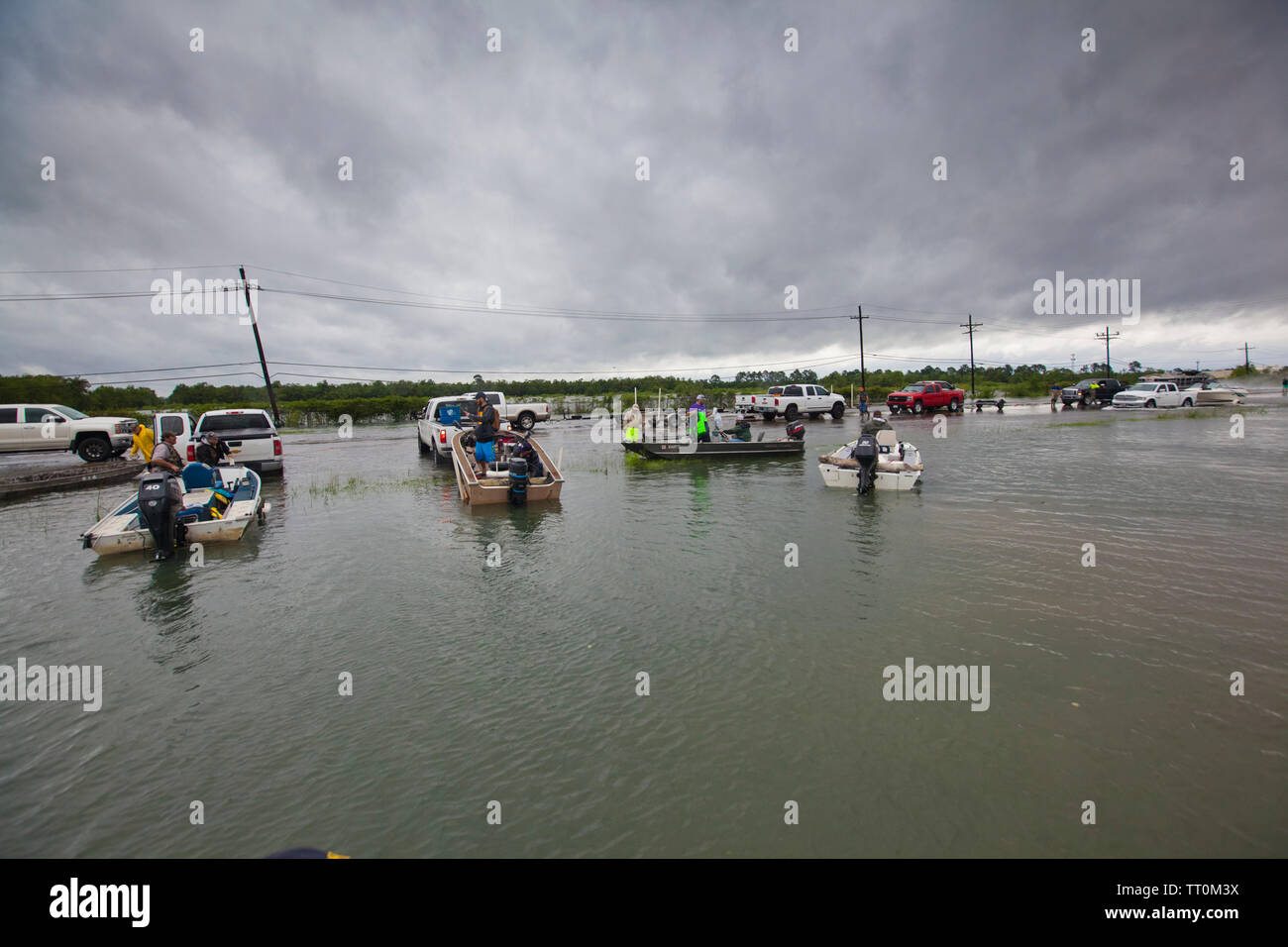 Cajun Navy launching their boats off the flooded roadway during ...