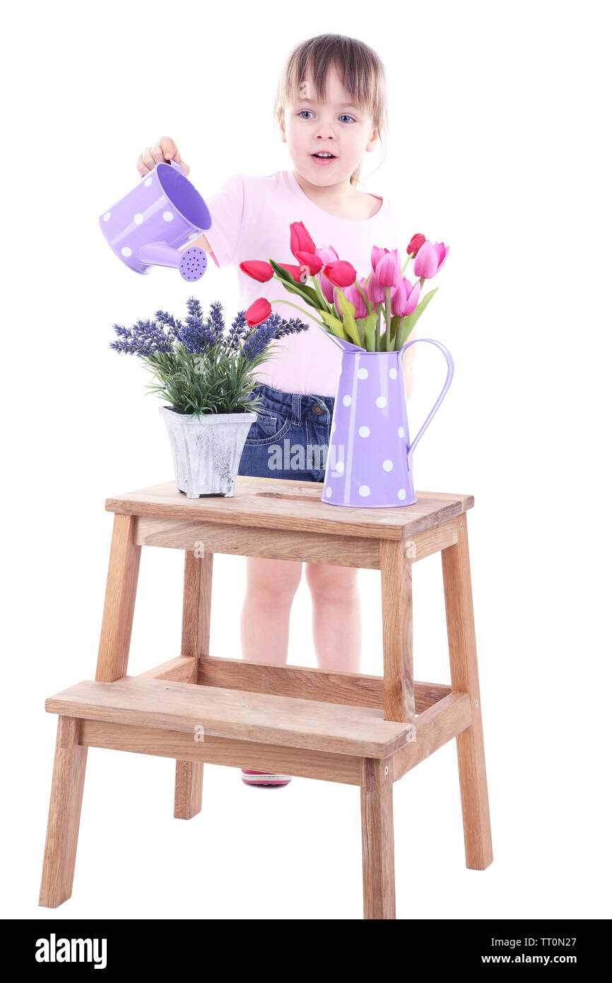 Beautiful little girl and stand with flowers isolated on white Stock ...