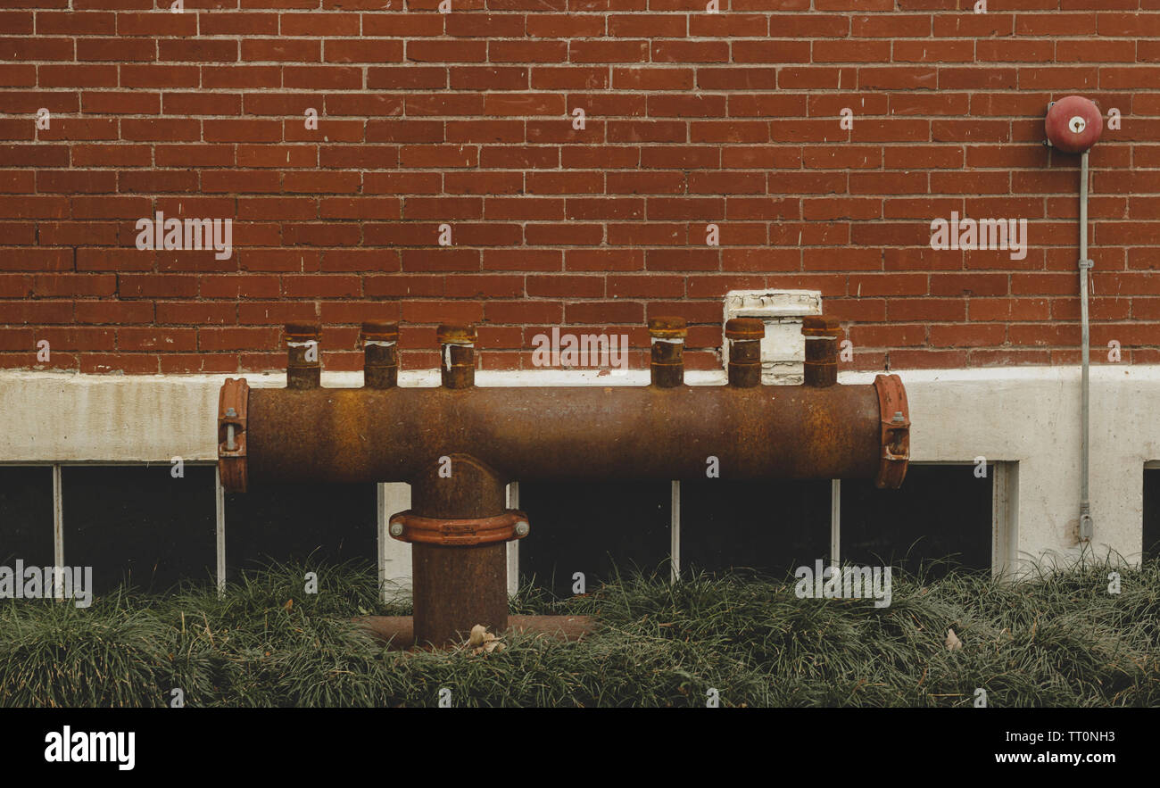 Rusted pipes outside a loft in Dallas Stock Photo - Alamy