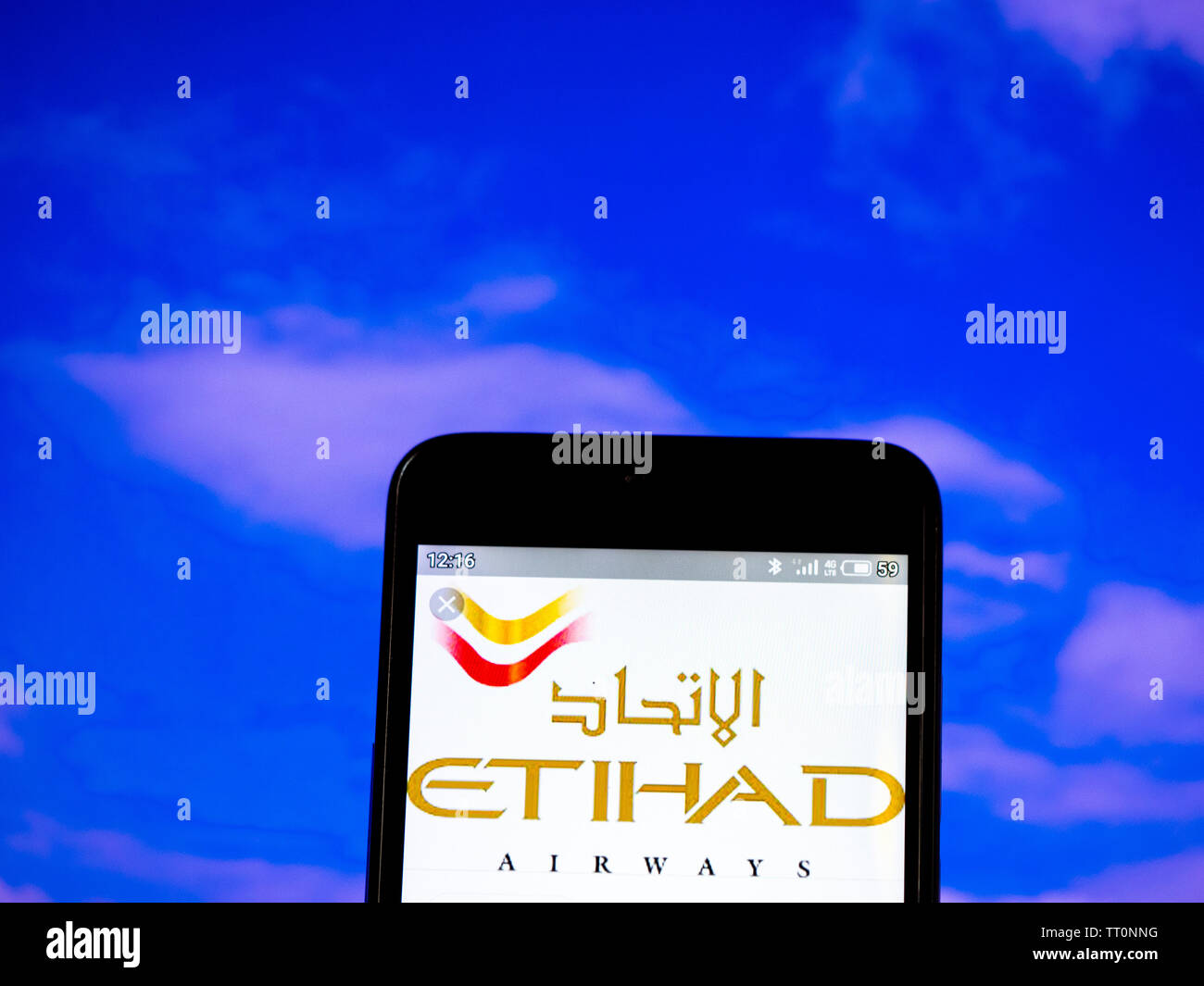 In this photo illustration the Etihad Airways logo is seen displayed on ...