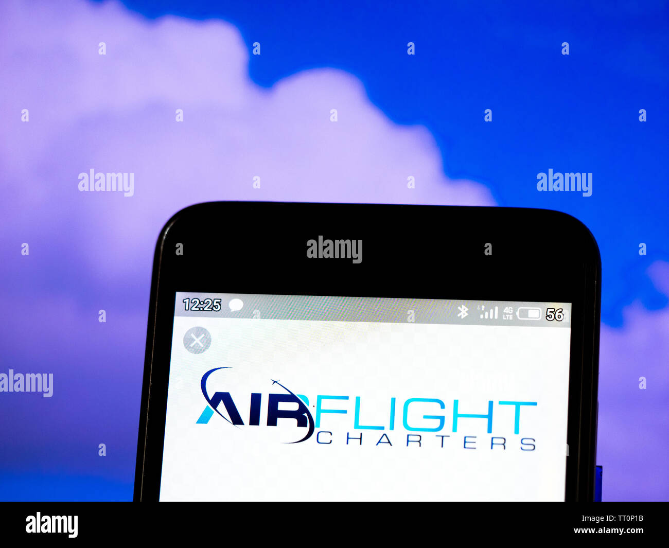 In this photo illustration the Air Flight Charters logo is seen ...