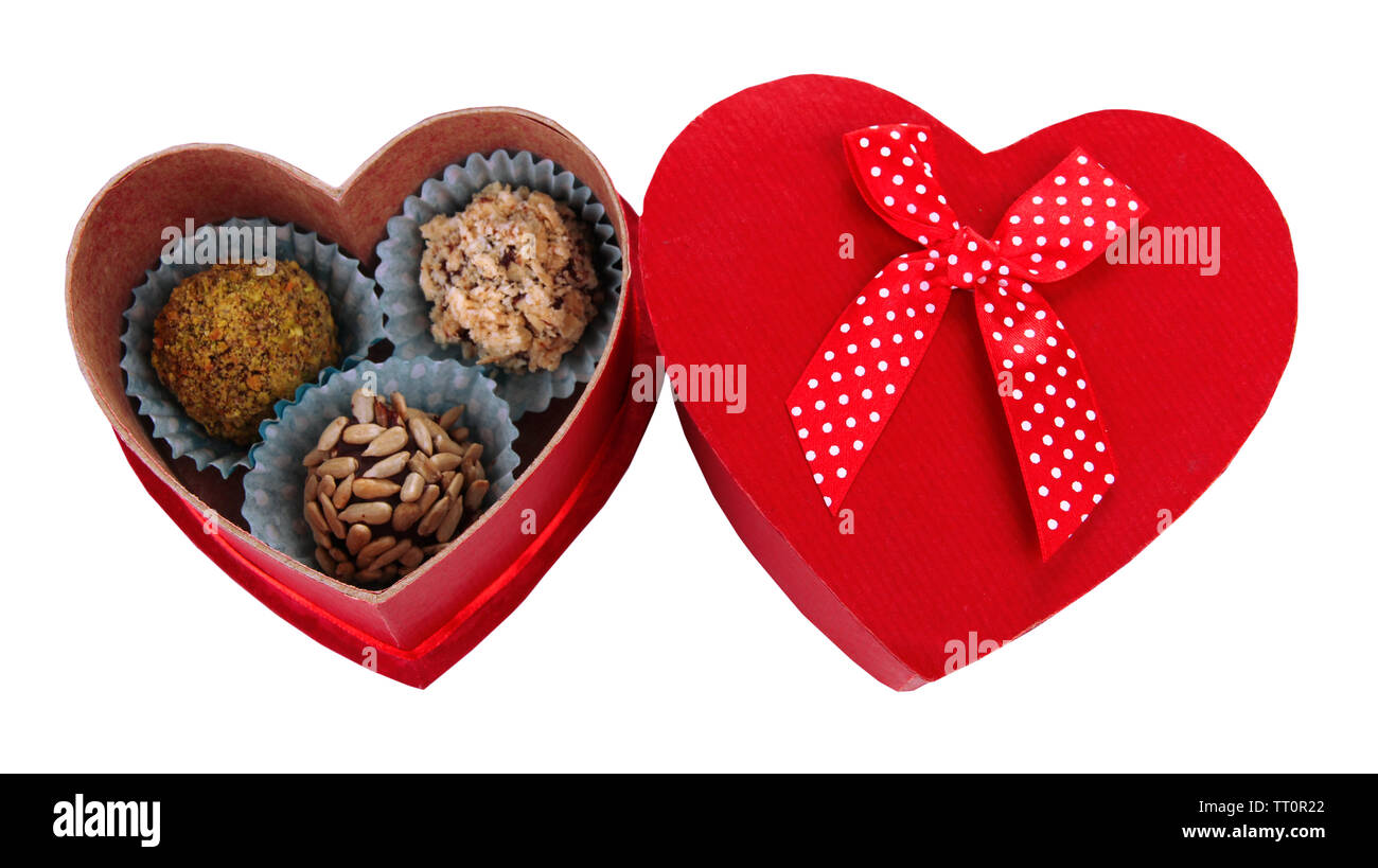 Chocolate candies in paper Cut Out Stock Images & Pictures - Alamy