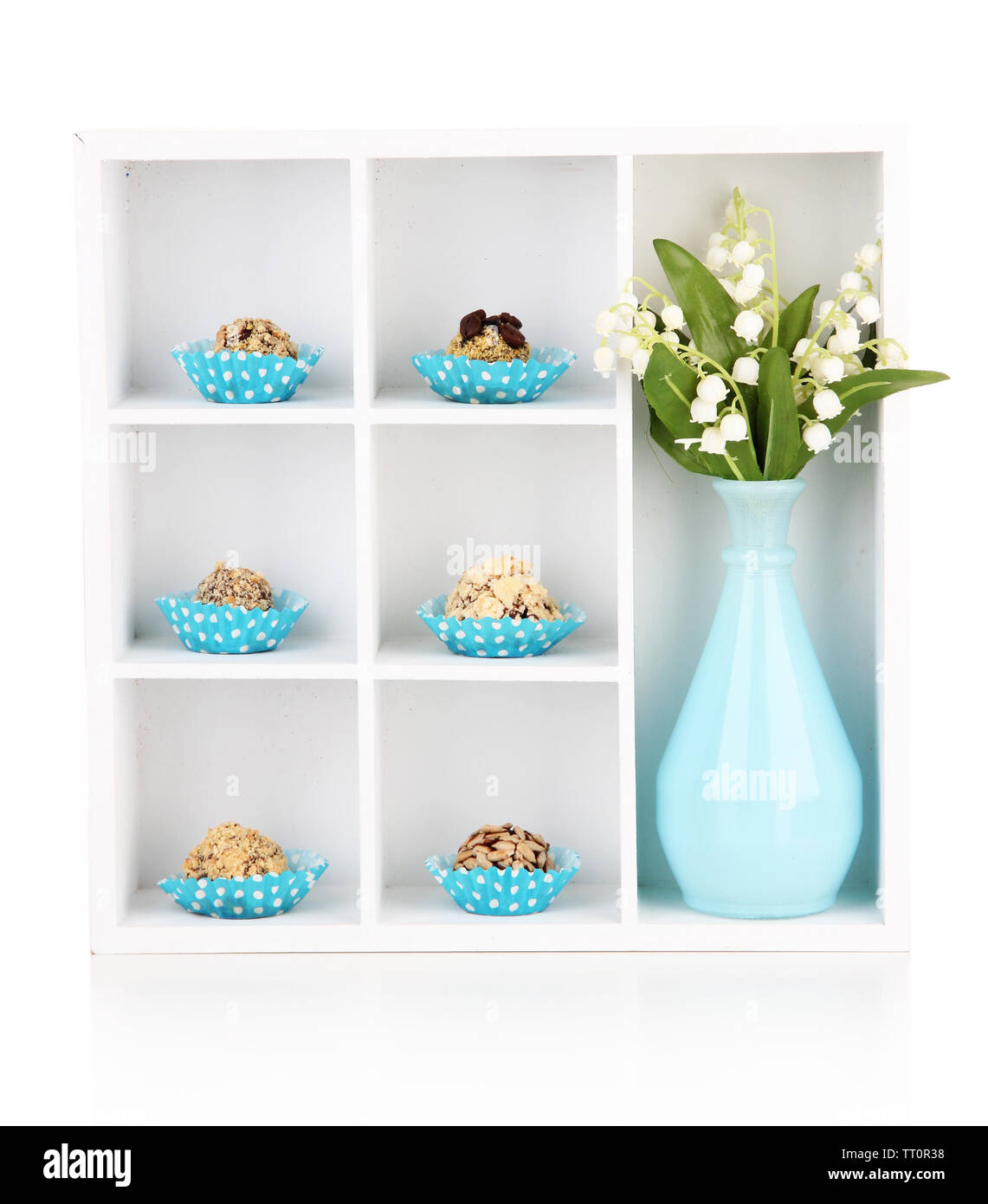 Chocolate candies in paper Cut Out Stock Images & Pictures - Alamy