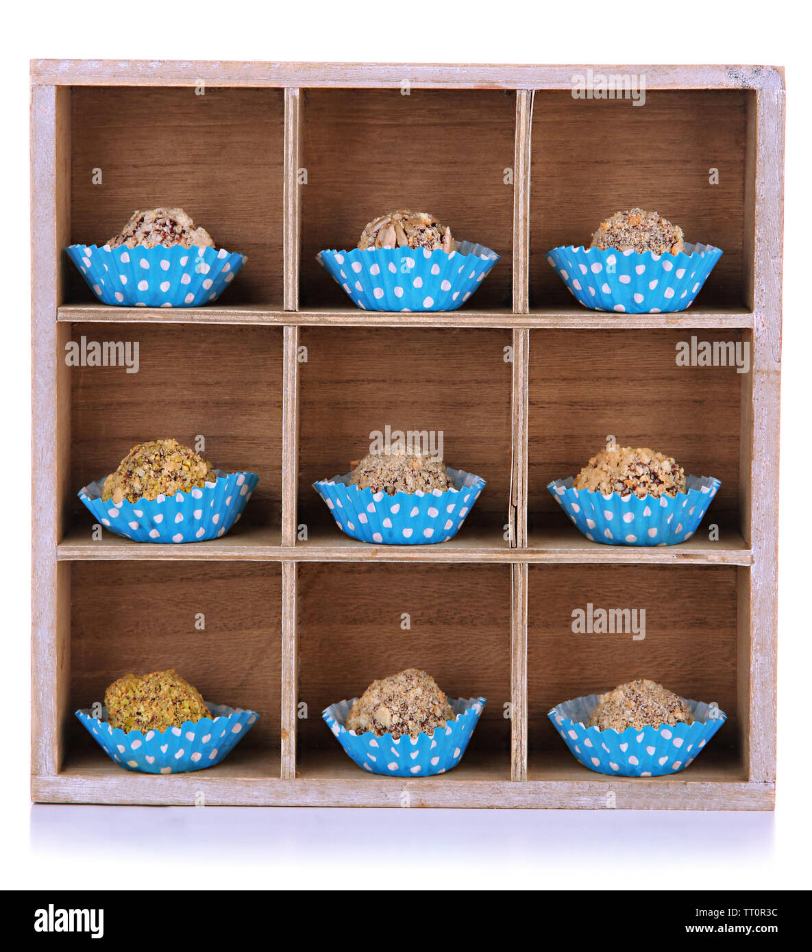 Chocolate candies in paper Cut Out Stock Images & Pictures - Alamy