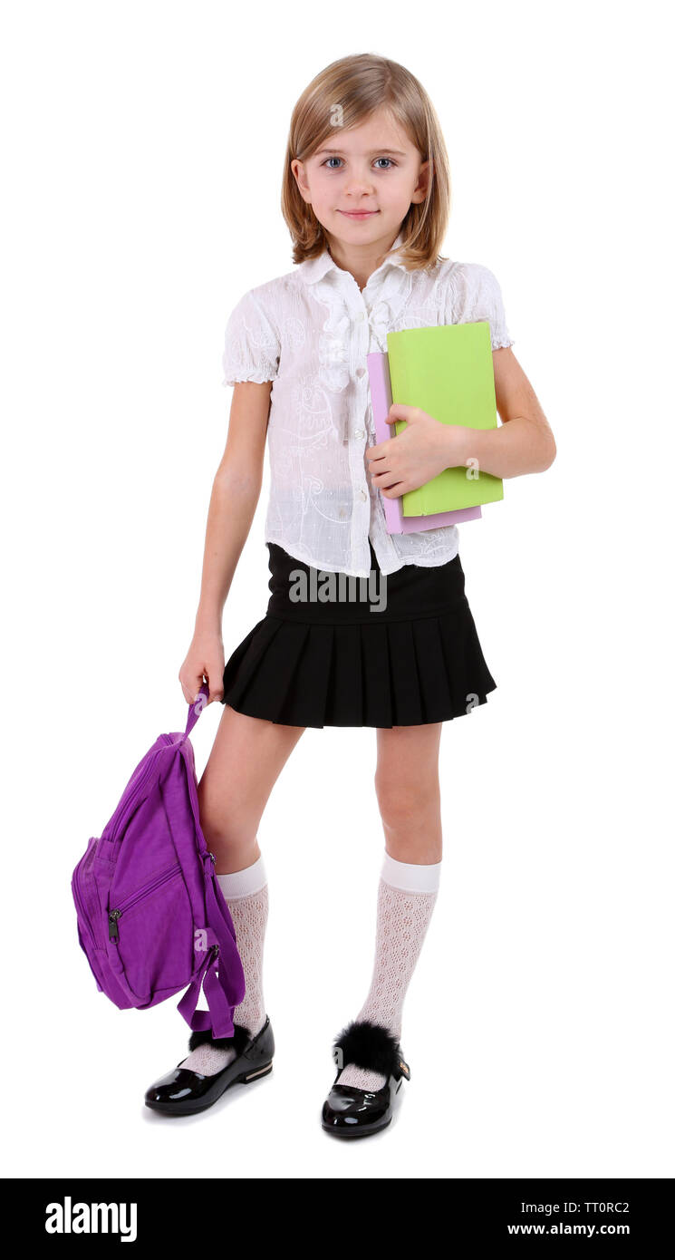 Beautiful little girl with backpack holding books isolated on white ...