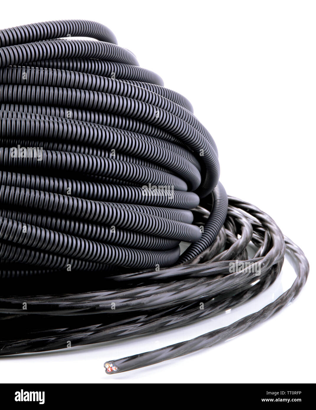 Black cables close-up isolated on white Stock Photo - Alamy