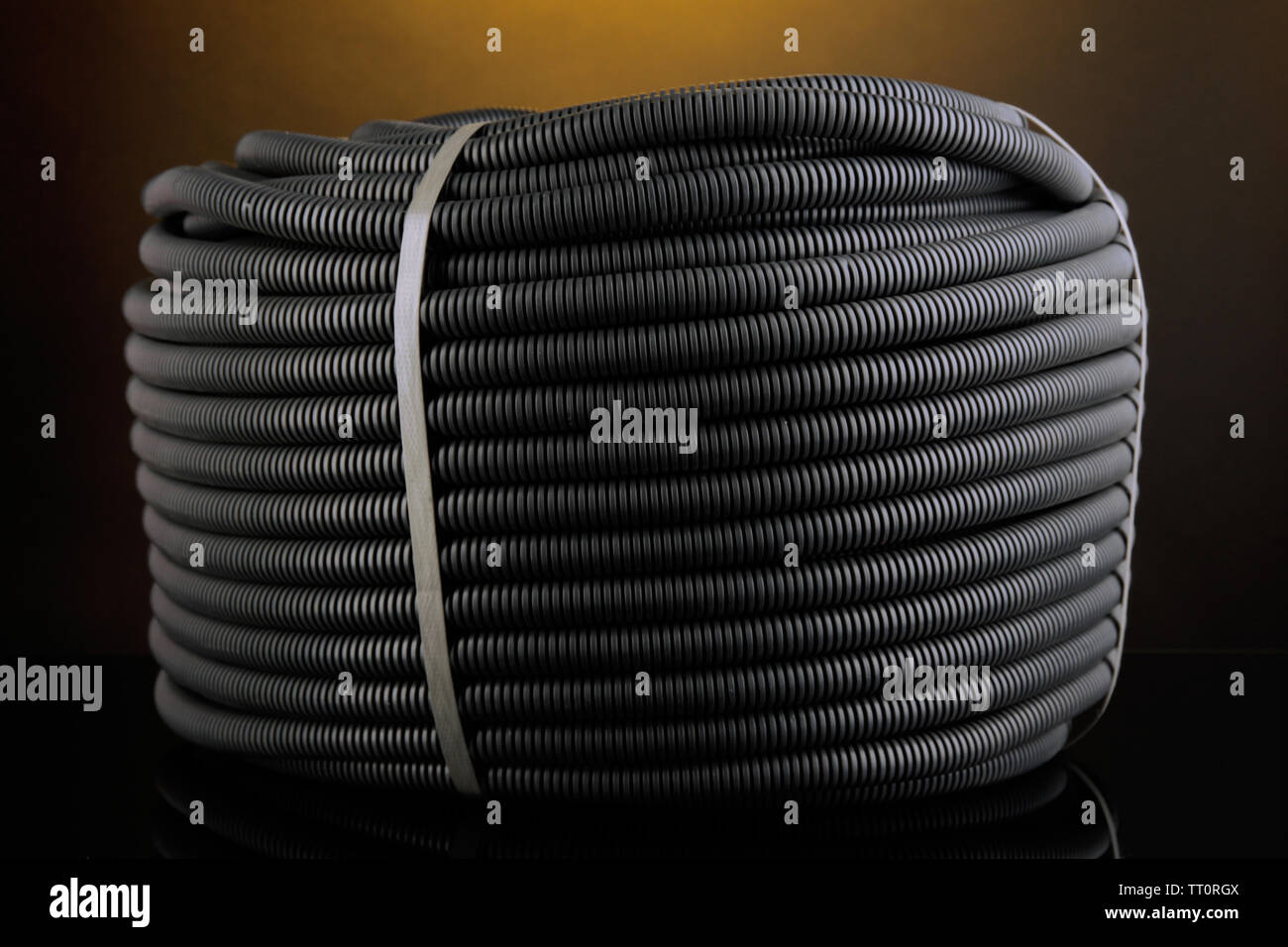 Black cable on colorful background Stock Photo - Alamy