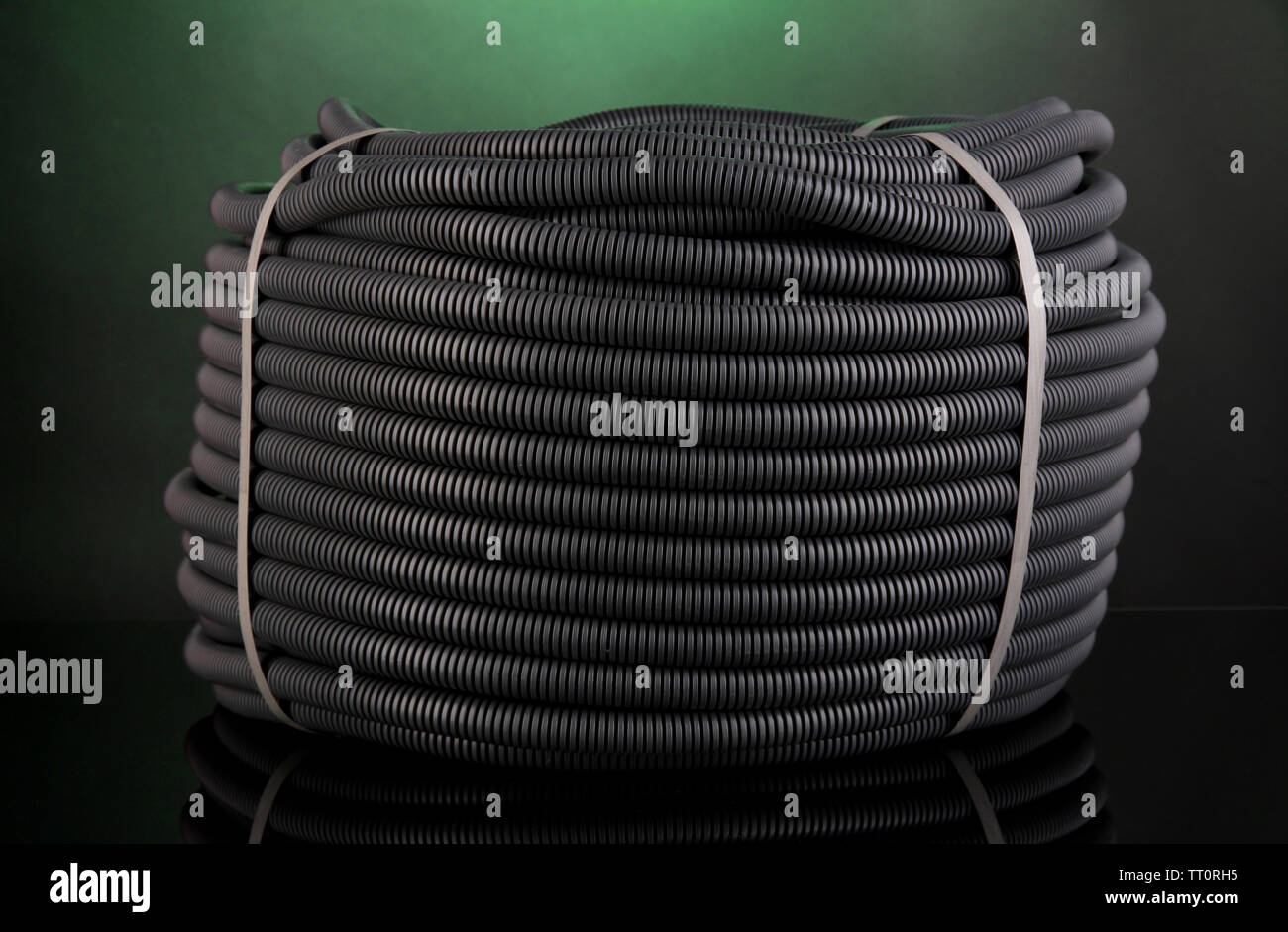 Black cable on colorful background Stock Photo - Alamy