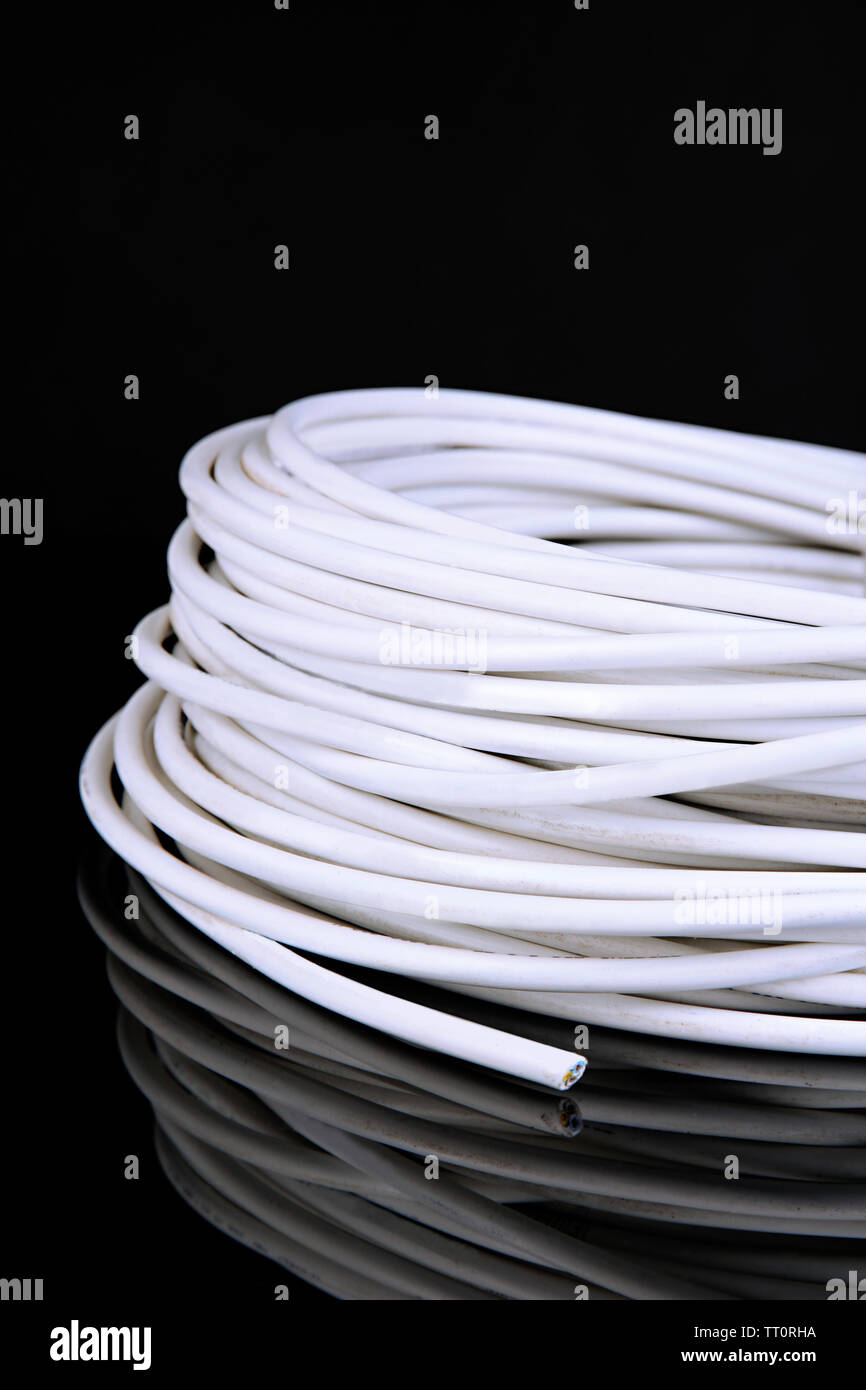 White cable on black background Stock Photo - Alamy