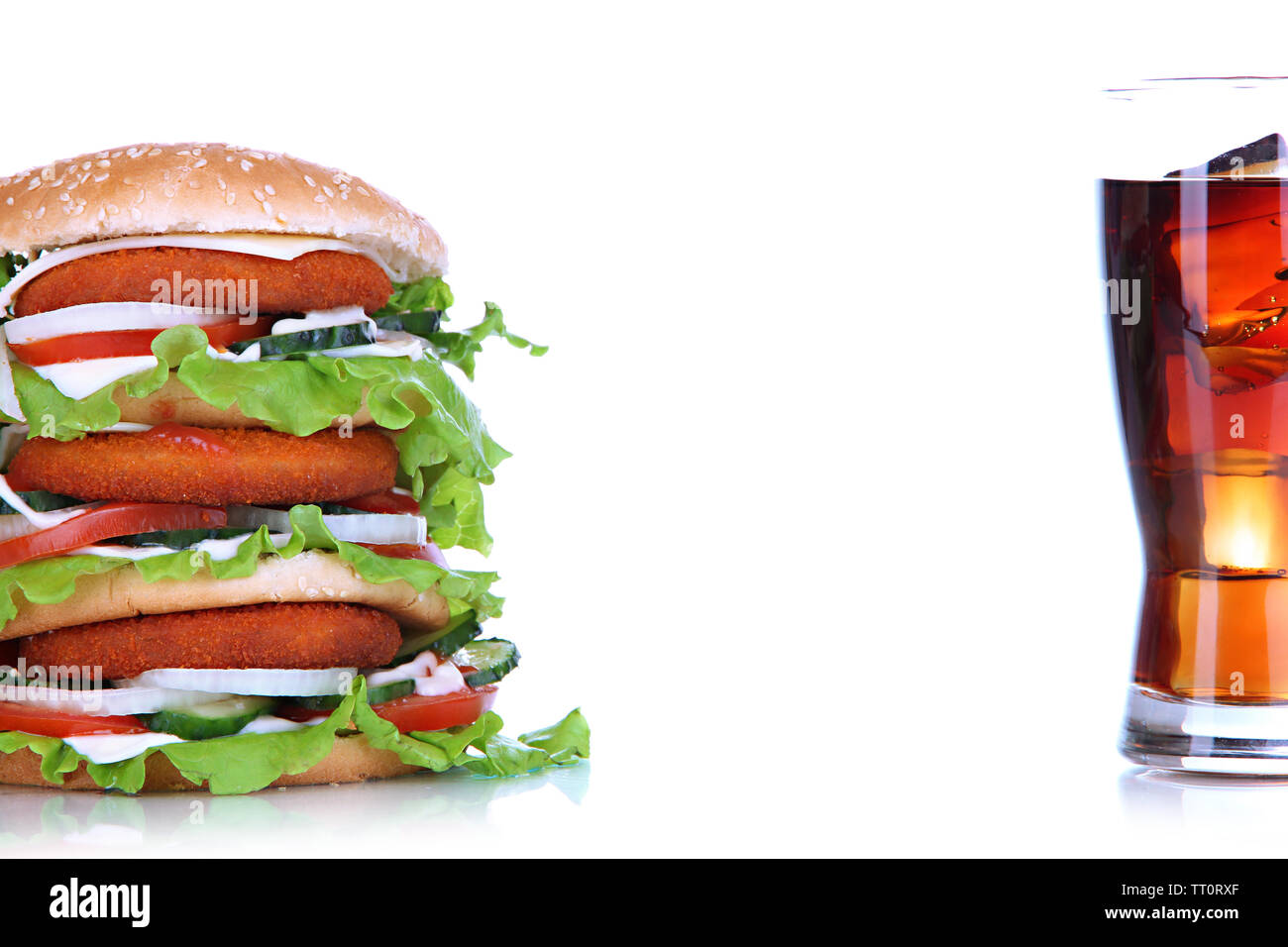 Huge burger and glass of cold drink, isolated on white Stock Photo - Alamy