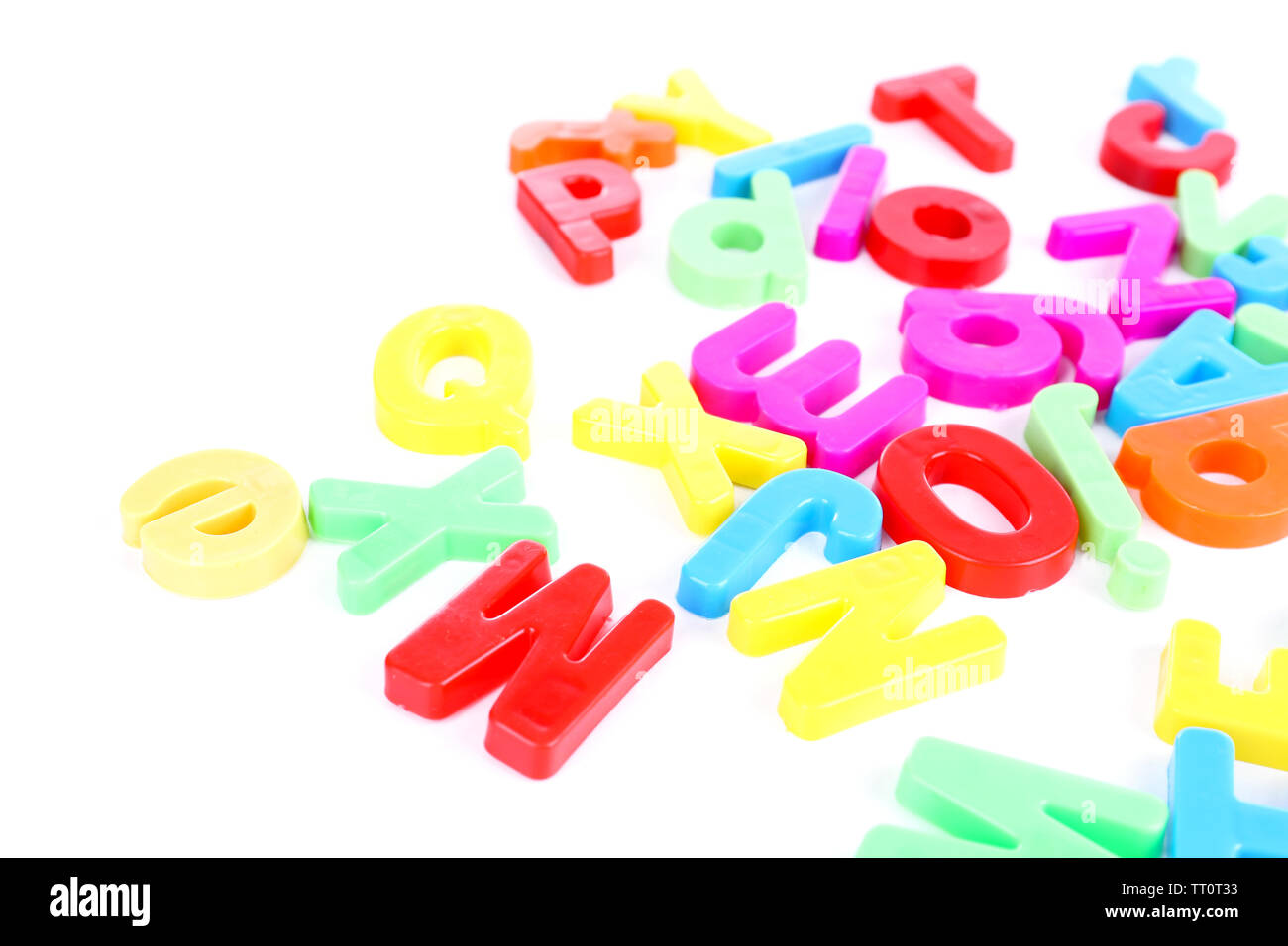 Colorful magnetic letters isolated on white Stock Photo - Alamy
