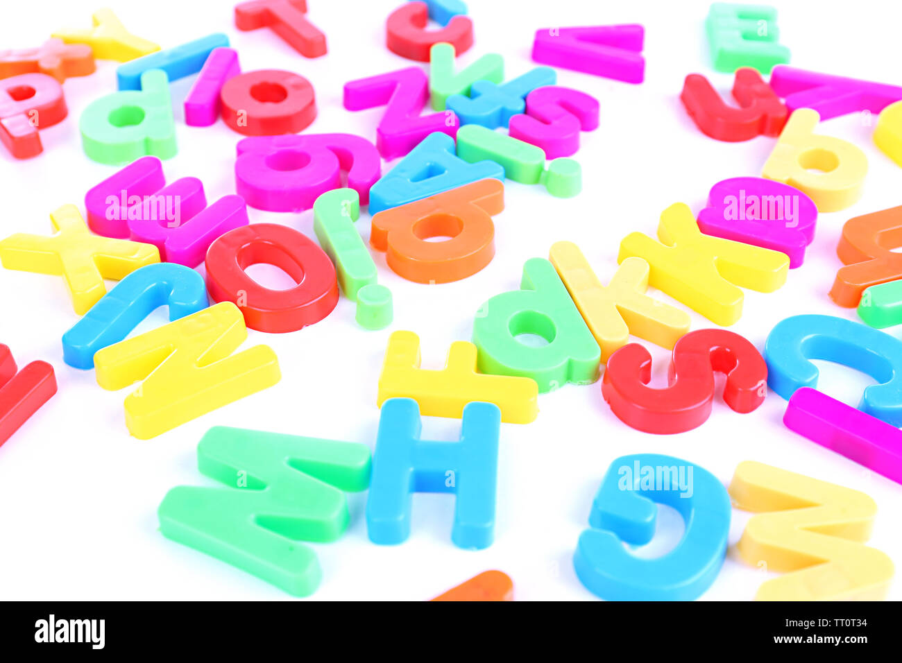 Colorful magnetic letters isolated on white Stock Photo - Alamy