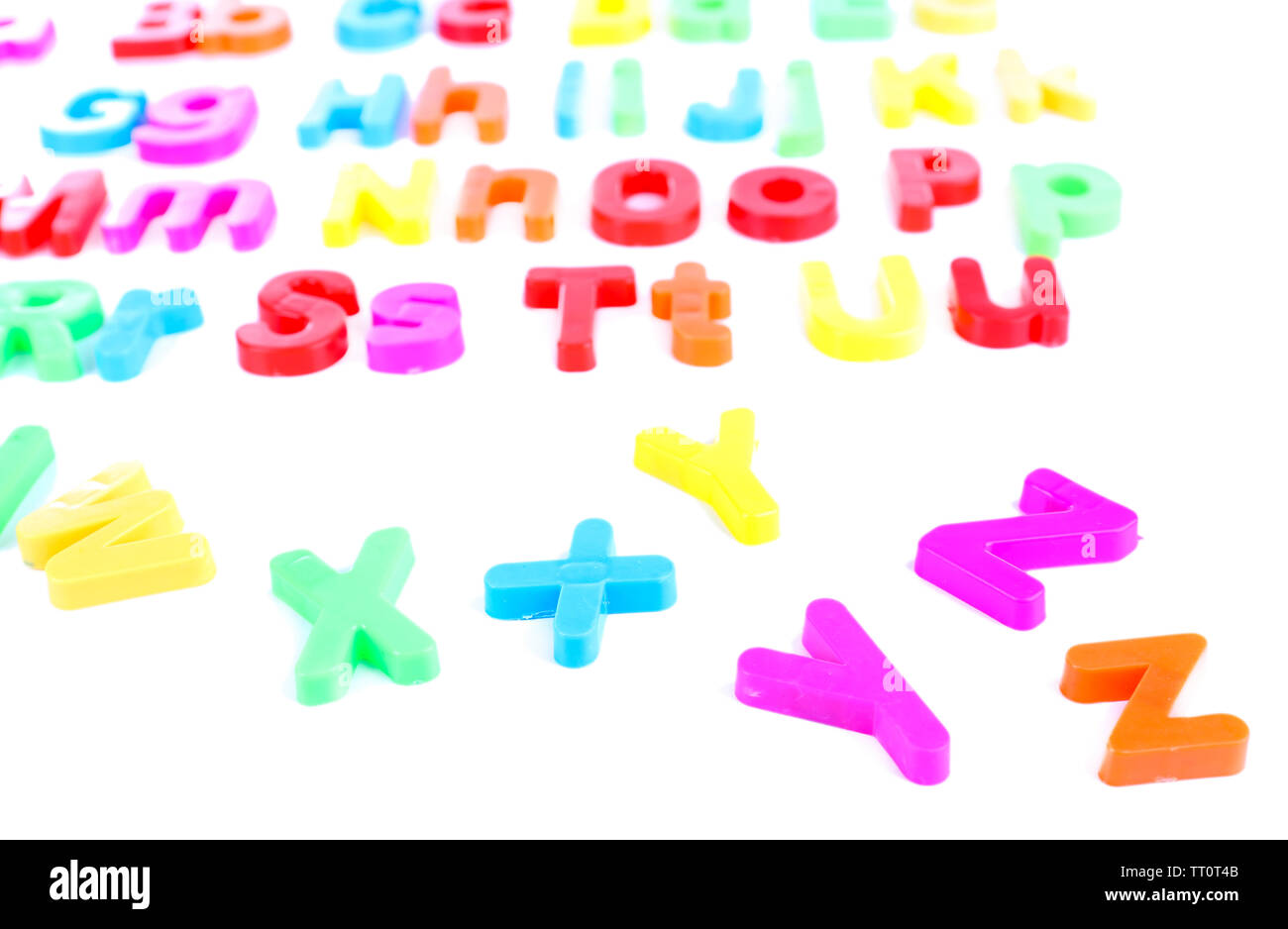 Colorful magnetic letters isolated on white Stock Photo - Alamy