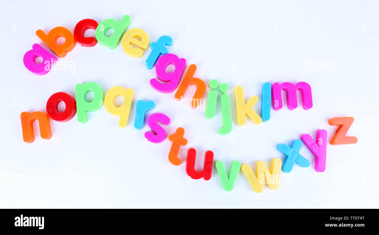 Colorful magnetic letters isolated on white Stock Photo - Alamy