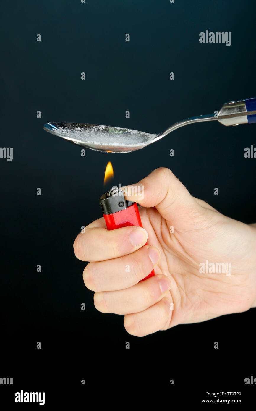 Heroin cooking in spoon drug hi-res stock photography and images - Alamy