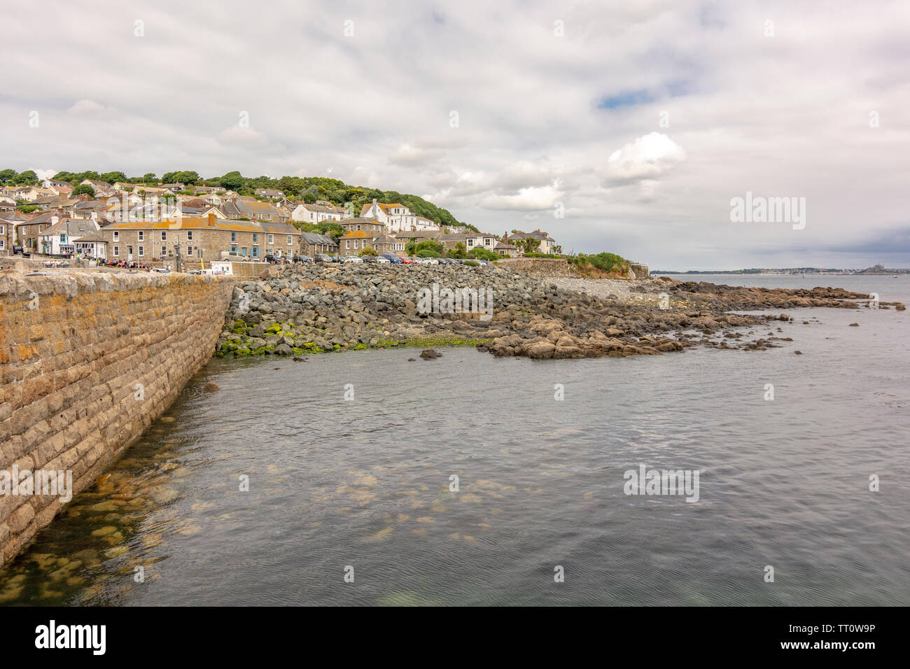 Mousehole sea wall and harbour entrance - Cornwall, UK Stock Photo - Alamy