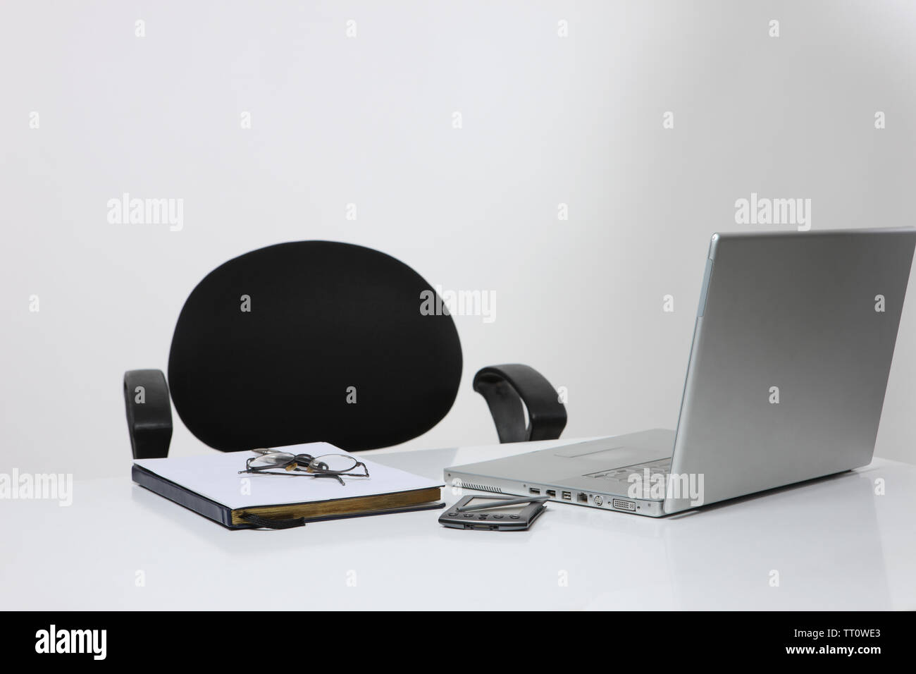 Laptop On A Desk In An Office Stock Photo - Alamy