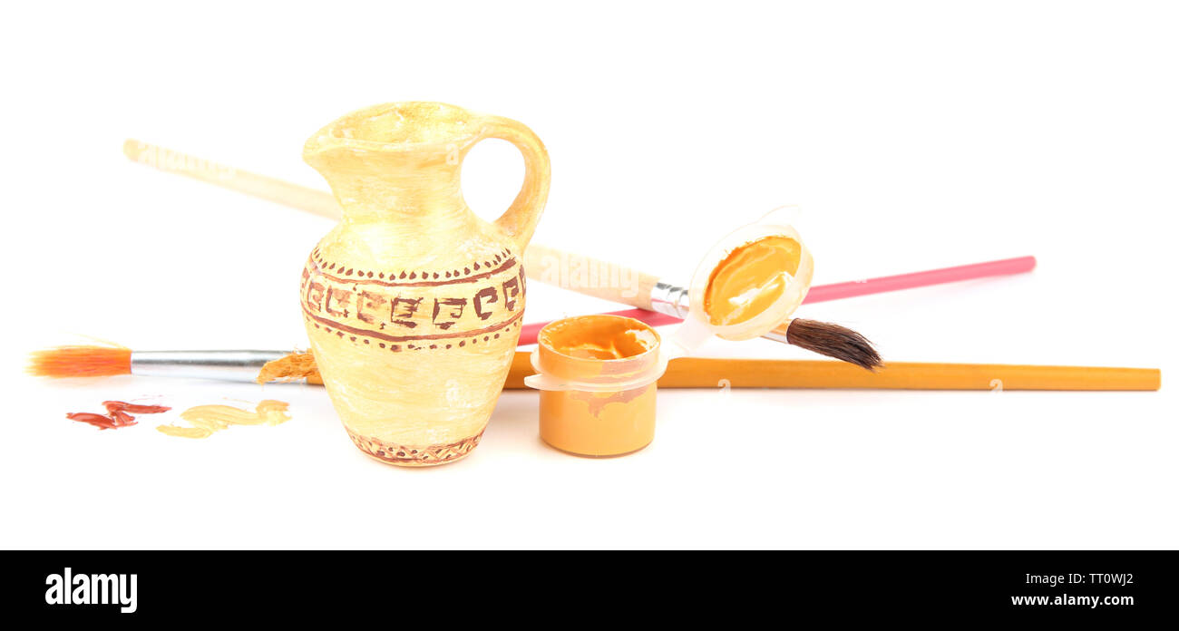 Hand made ceramic amphora and color paints isolated on white Stock ...