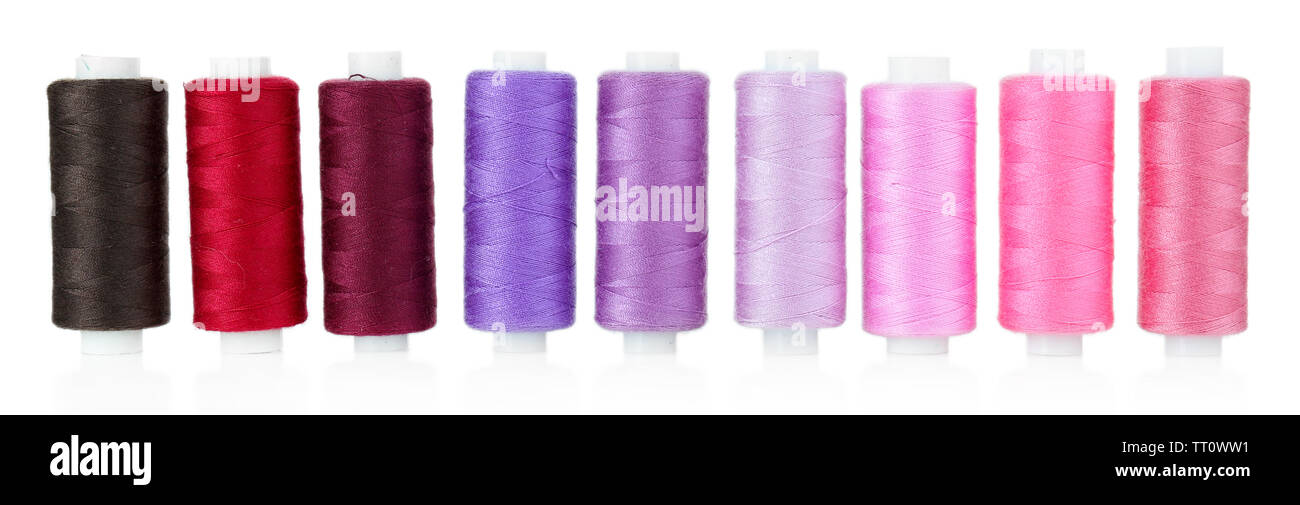 Colored spools of threads isolated on white Stock Photo - Alamy