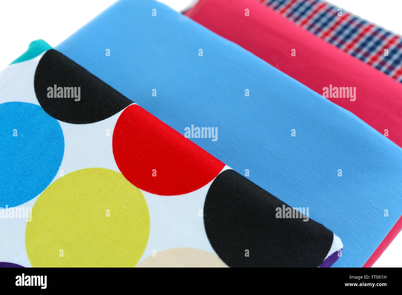 Pile of colored fabrics close up Stock Photo - Alamy