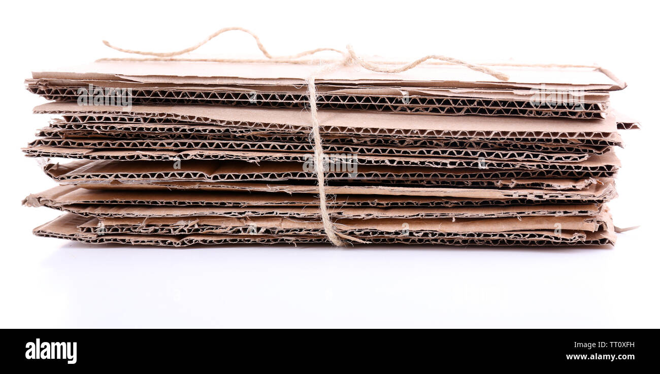 Stack of cardboard for recycling isolated on white Stock Photo - Alamy