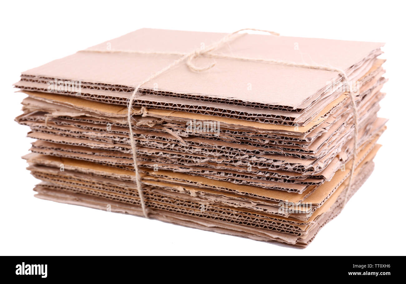 Stack of cardboard for recycling isolated on white Stock Photo - Alamy
