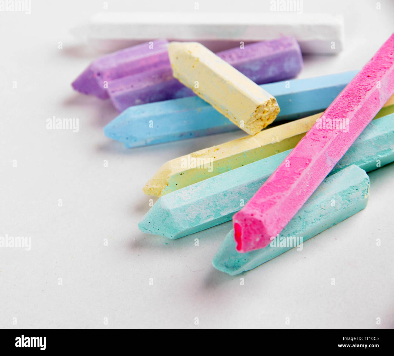 Chalks in variety of colors, isolated on white Stock Photo - Alamy