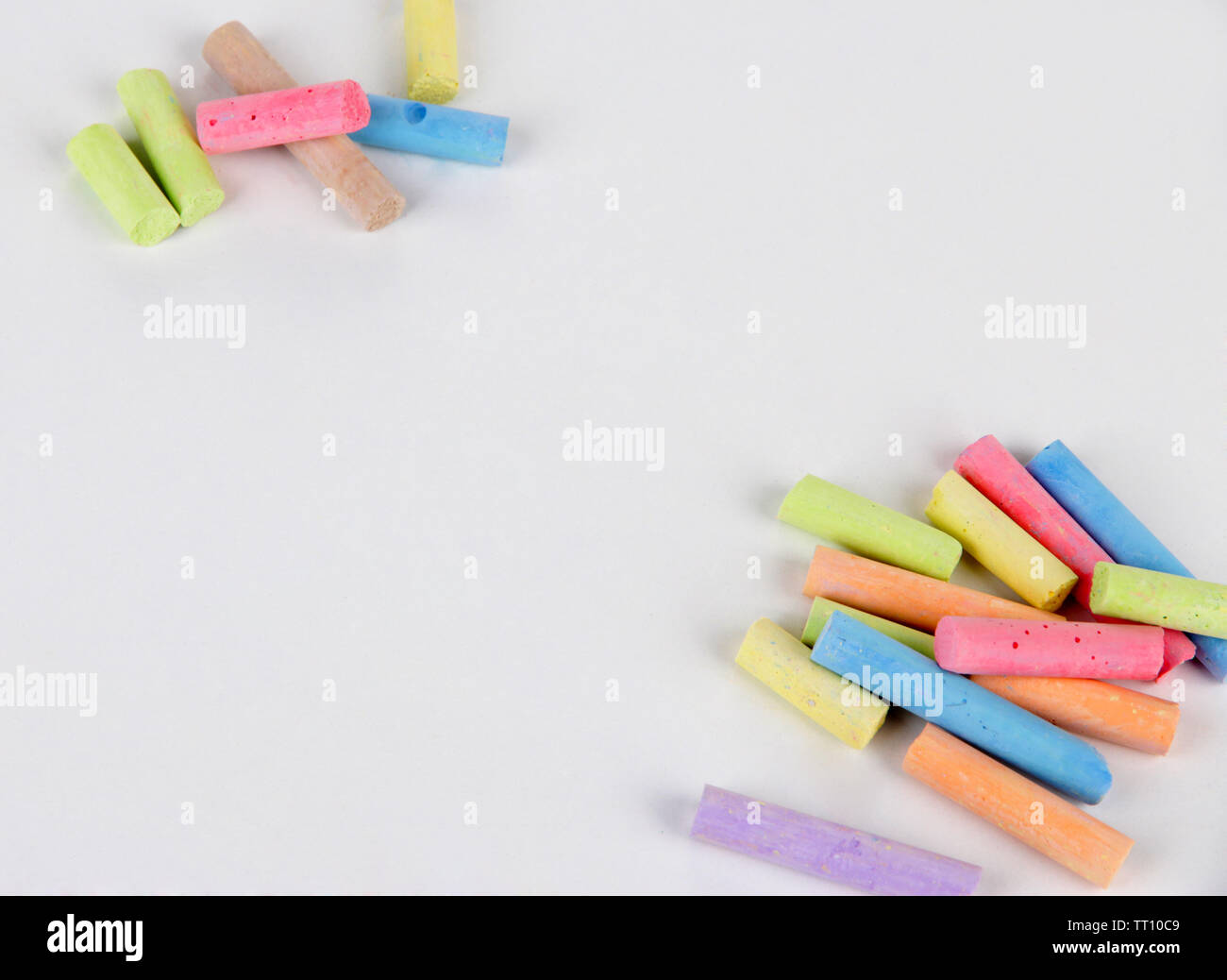 Chalks in variety of colors, isolated on white Stock Photo - Alamy