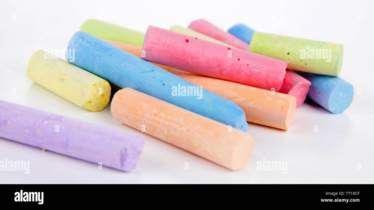 Chalks in variety of colors, isolated on white Stock Photo - Alamy