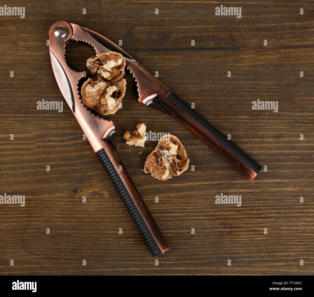 Nutcracker and walnuts isolated on white background Stock Photo - Alamy