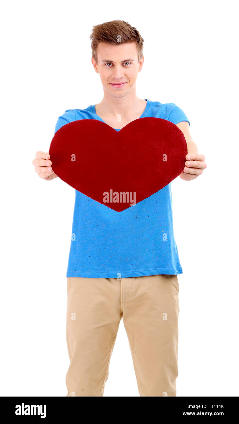 Handsome young man with big red heart, isolated on white Stock Photo ...