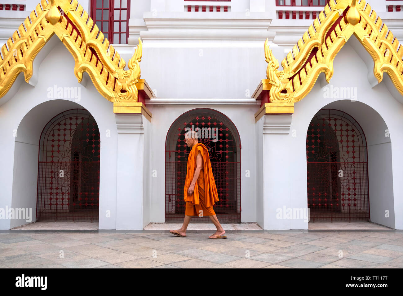 Buddhist monk walking, Buddhist monk turn around the temple Stock Photo ...