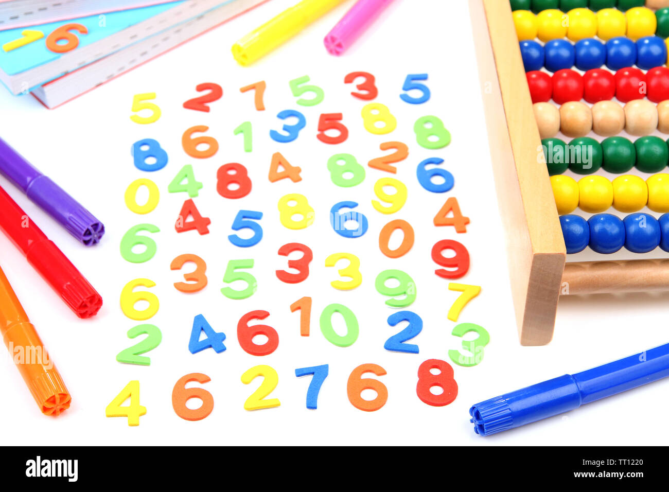 Colorful numbers, abacus, books and markers, isolated on white Stock ...
