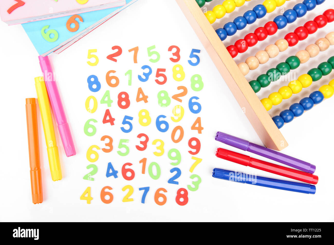 Colorful numbers, markers and abacus, isolated on white Stock Photo - Alamy
