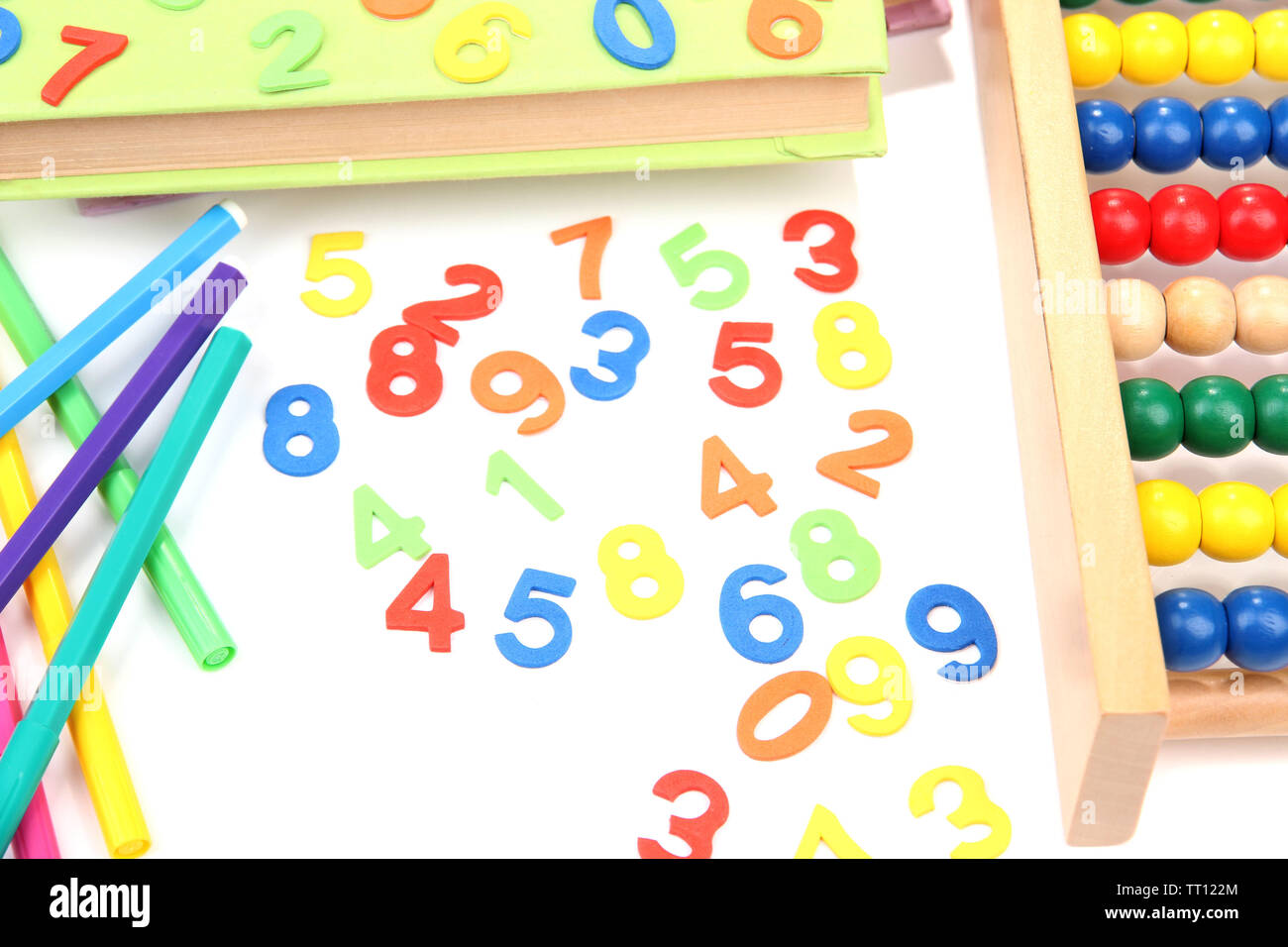 Colorful numbers, abacus, books and markers, isolated on white Stock ...