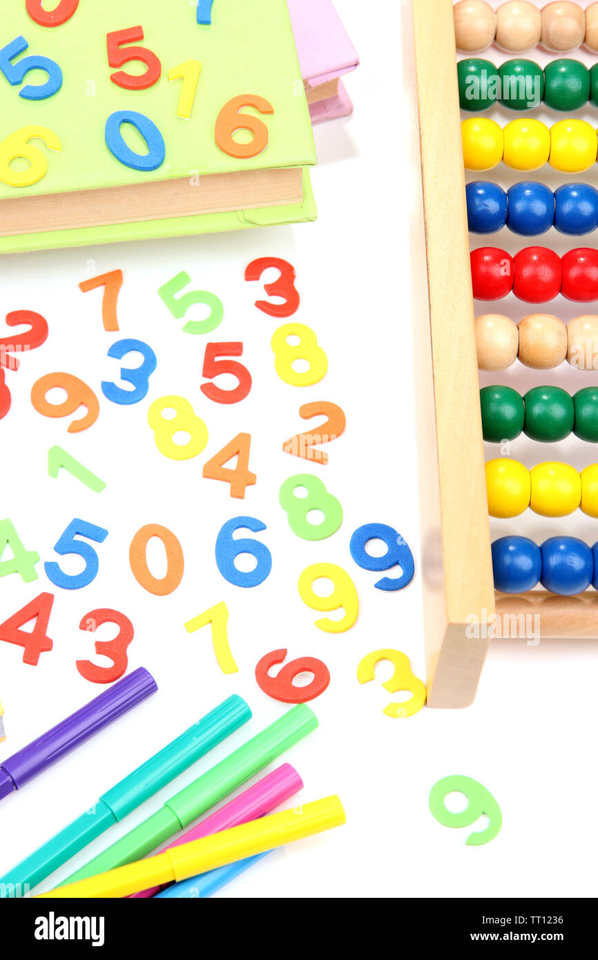 Colorful numbers, abacus, books and markers, isolated on white Stock ...