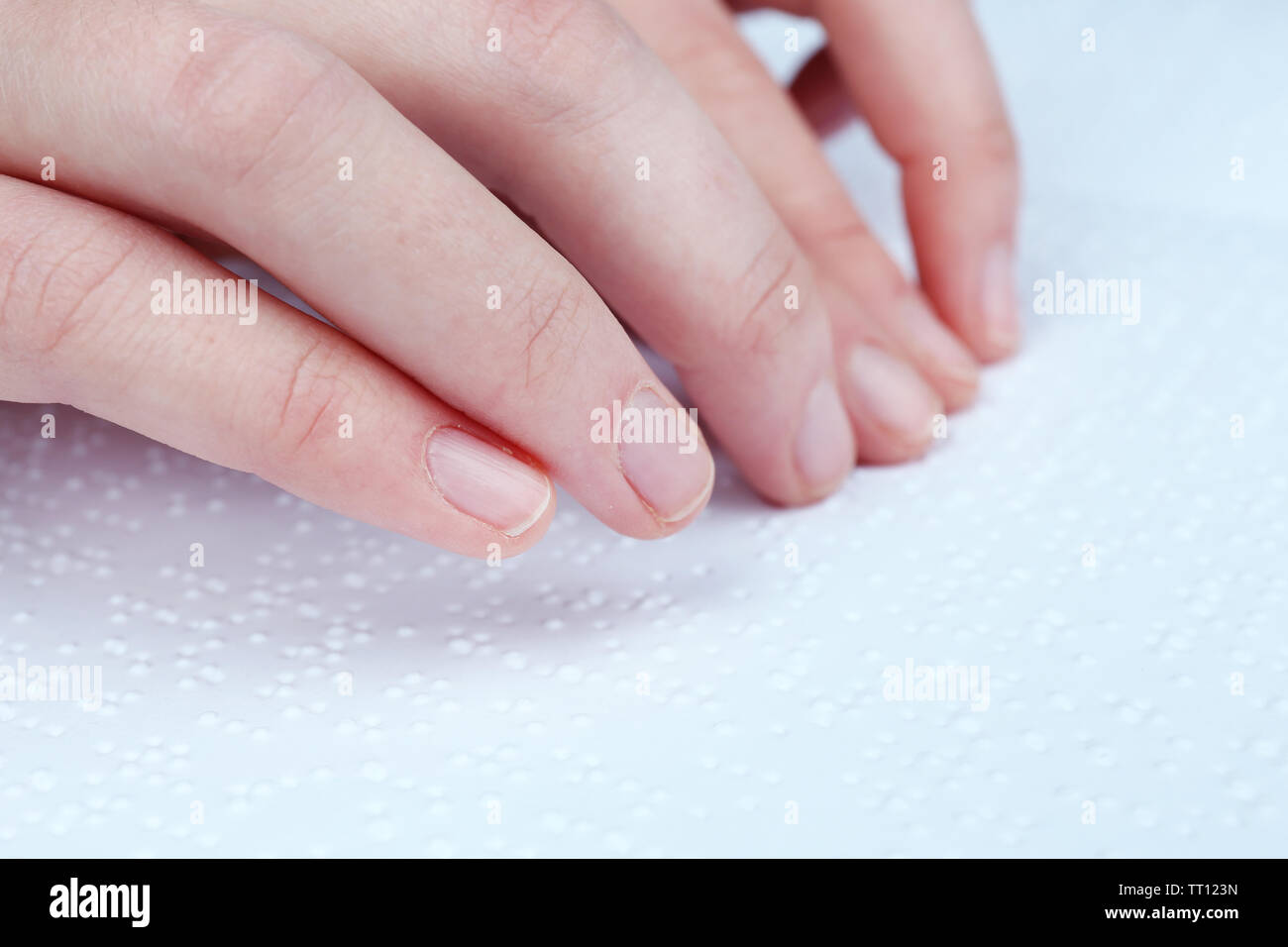 Blind woman read book written in Braille Stock Photo - Alamy