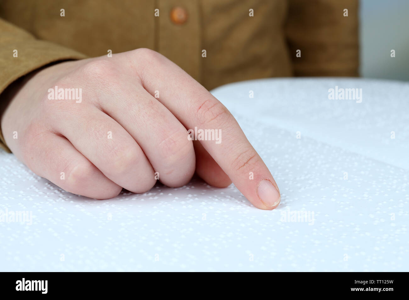 Blind woman read book written in Braille Stock Photo - Alamy