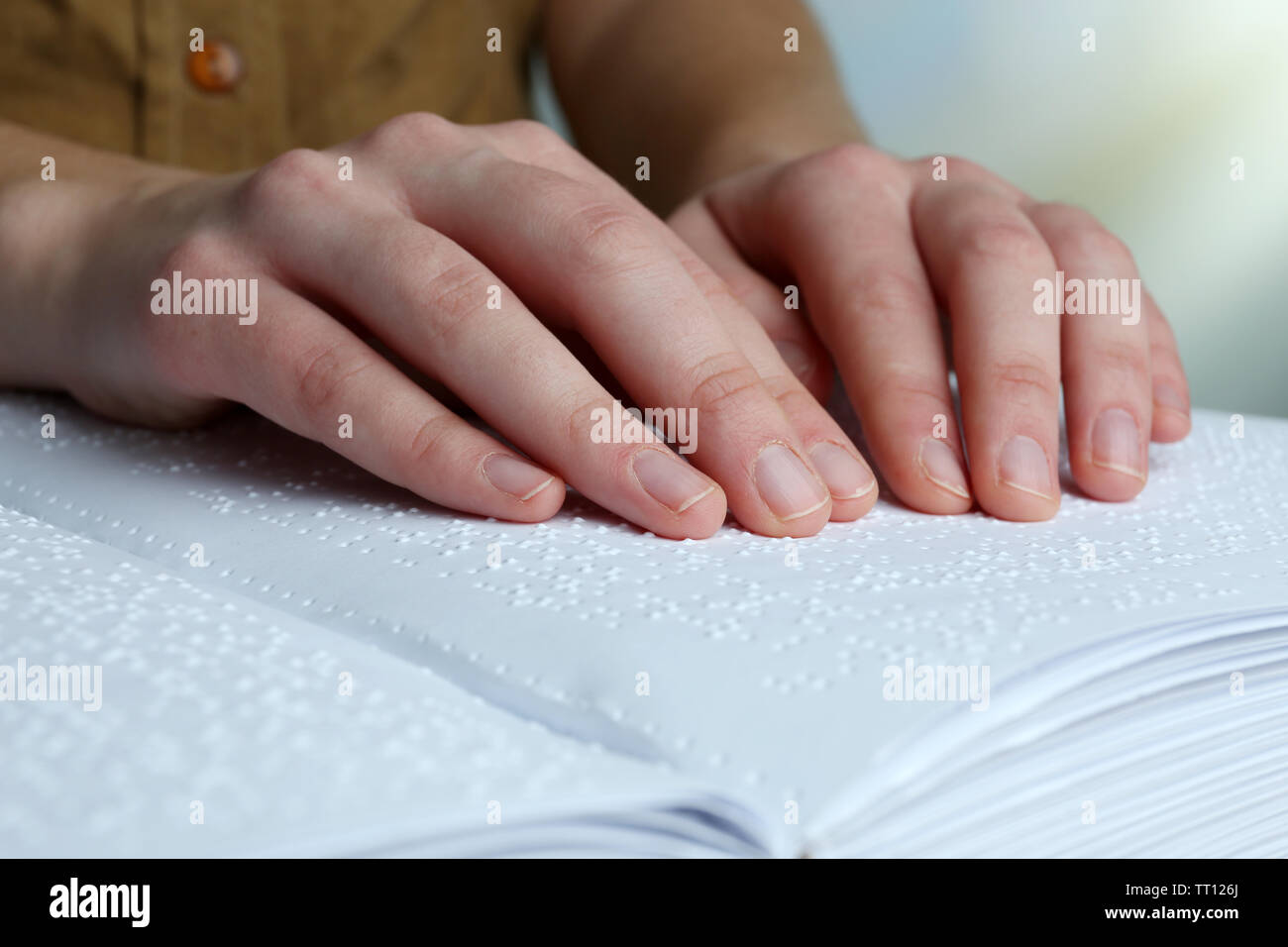 Blind girl reading braille book hi-res stock photography and images - Alamy