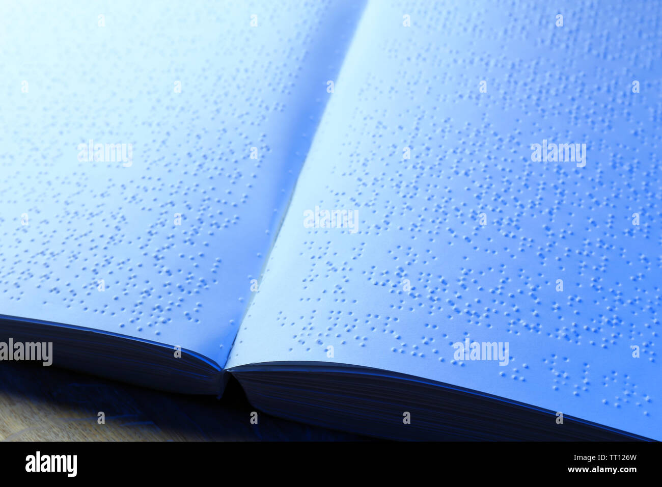Book written in braille alphabet for blind people Stock Photo - Alamy