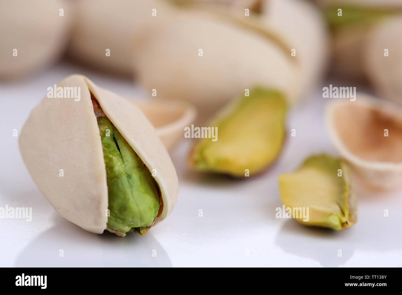 Pistachio nuts close up Stock Photo - Alamy