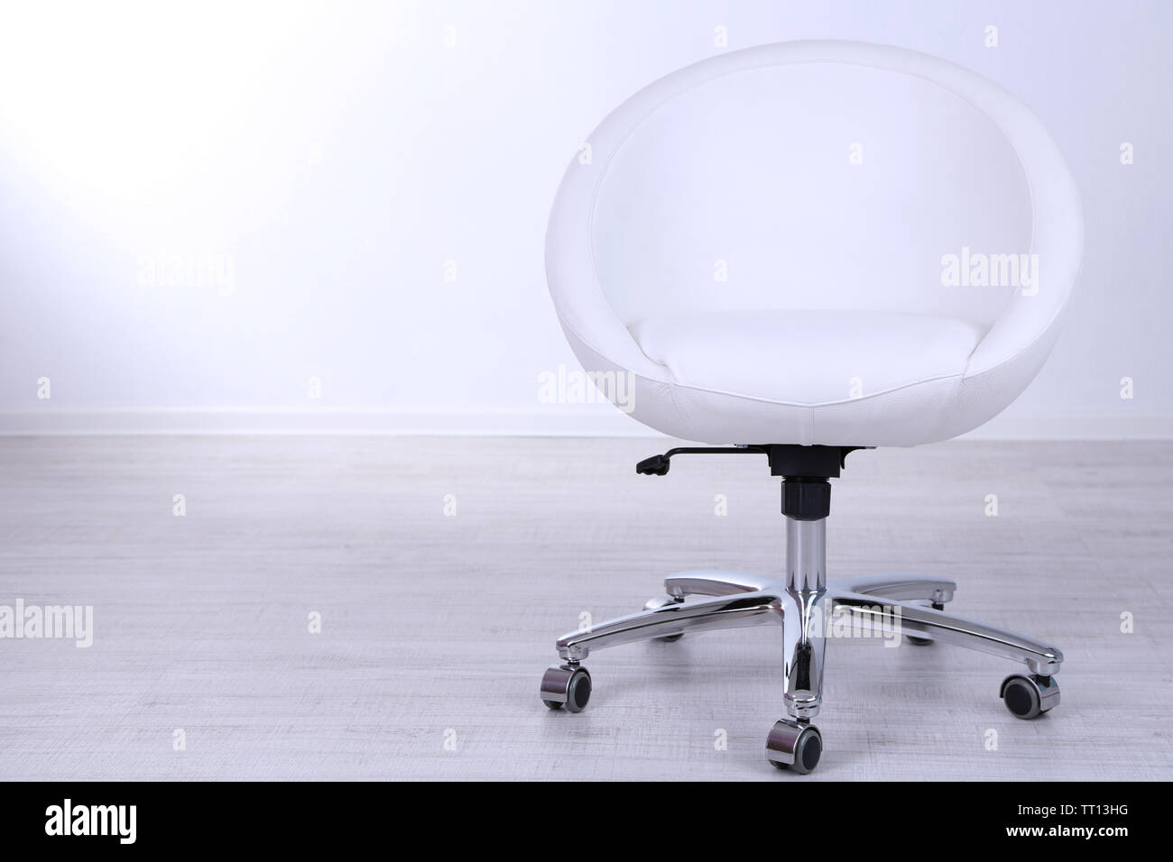 Modern chair in room on white background Stock Photo - Alamy