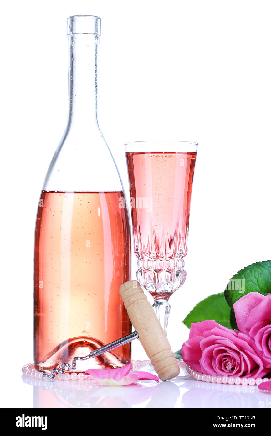 Composition with pink sparkle wine in glass, bottle and pink roses ...