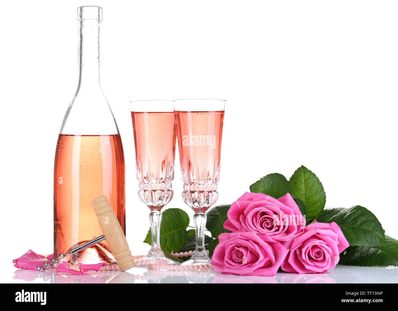 Composition with pink sparkle wine in glasses, bottle and pink roses ...