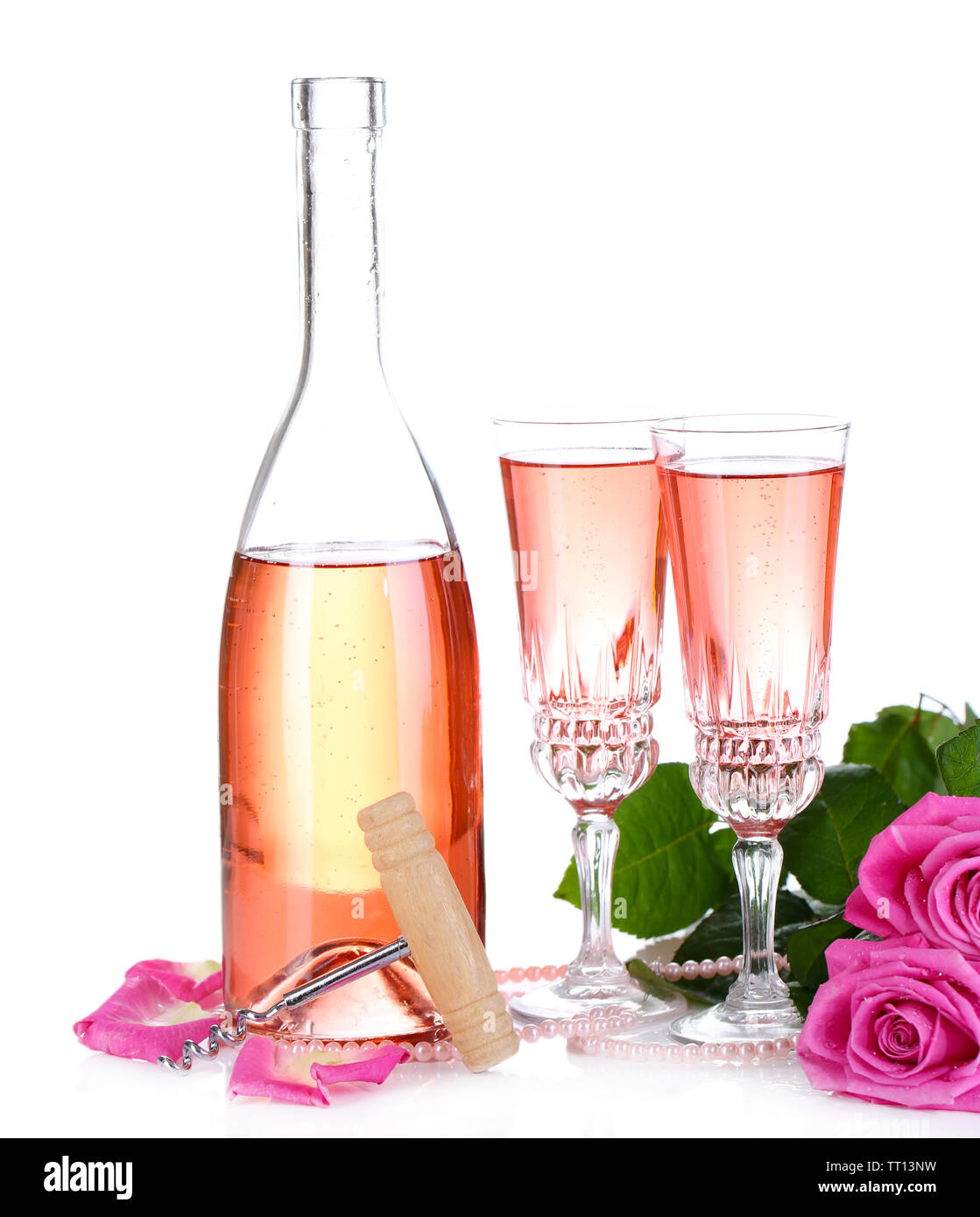 Composition with pink sparkle wine in glasses, bottle and pink roses ...
