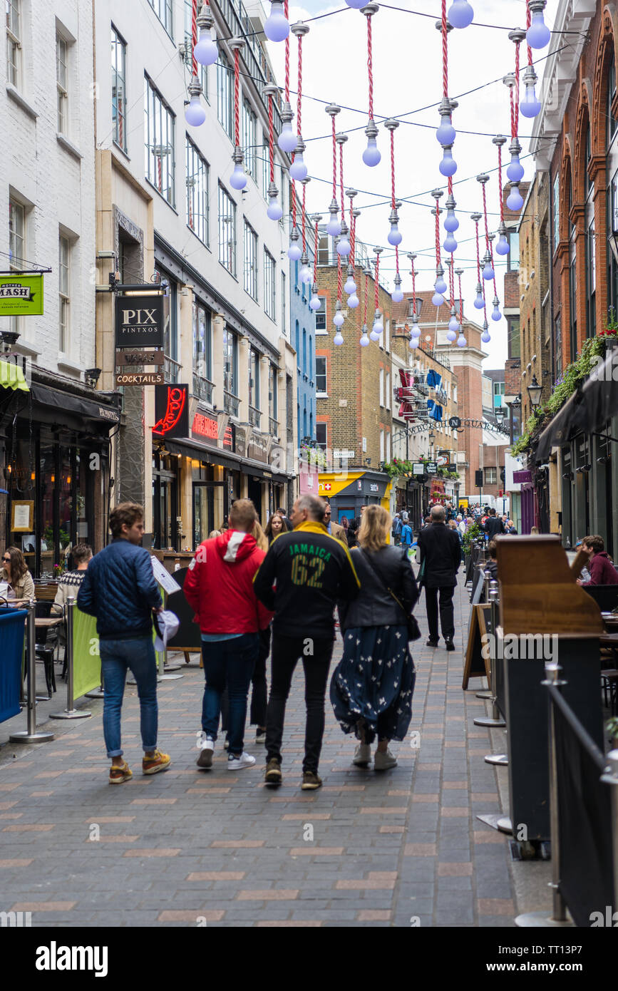 Saturday shoppers and tourists in Ganton Street, Soho, London Stock ...
