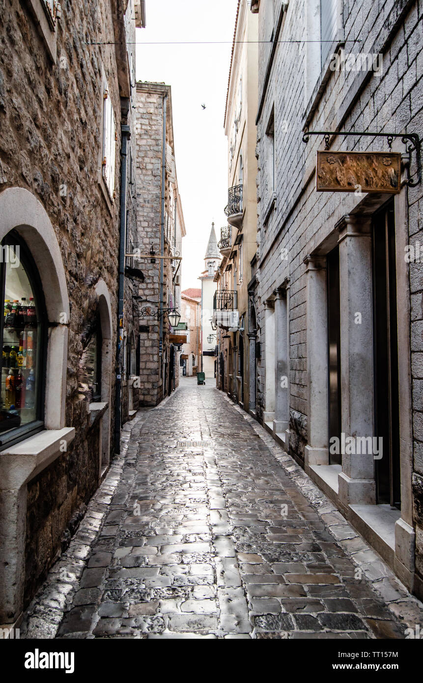 Narrow streets of the old stone town with stone blocks.On cloudy days ...