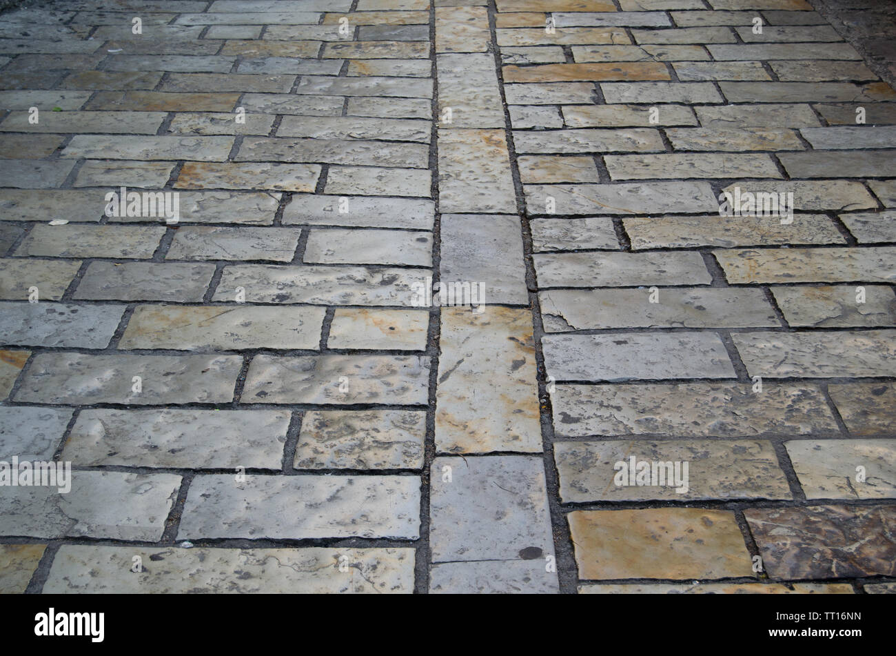 Ancient stone blocks of the old town.Pedestrian road Stock Photo - Alamy