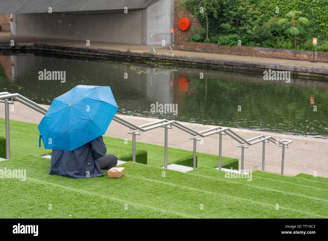 Sitting steps rain hi-res stock photography and images - Alamy